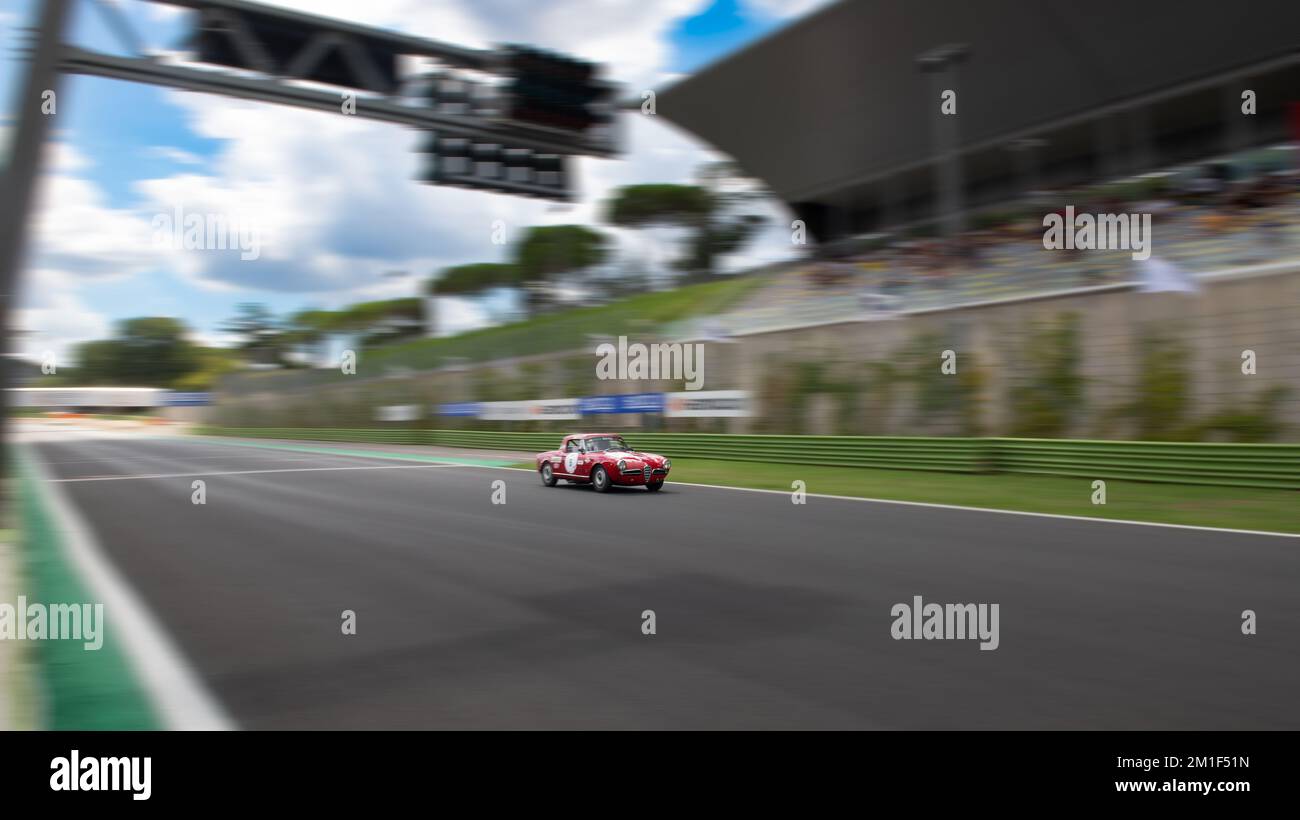 Old fashioned historical car Alfa Romeo Giulietta SP in action on ...