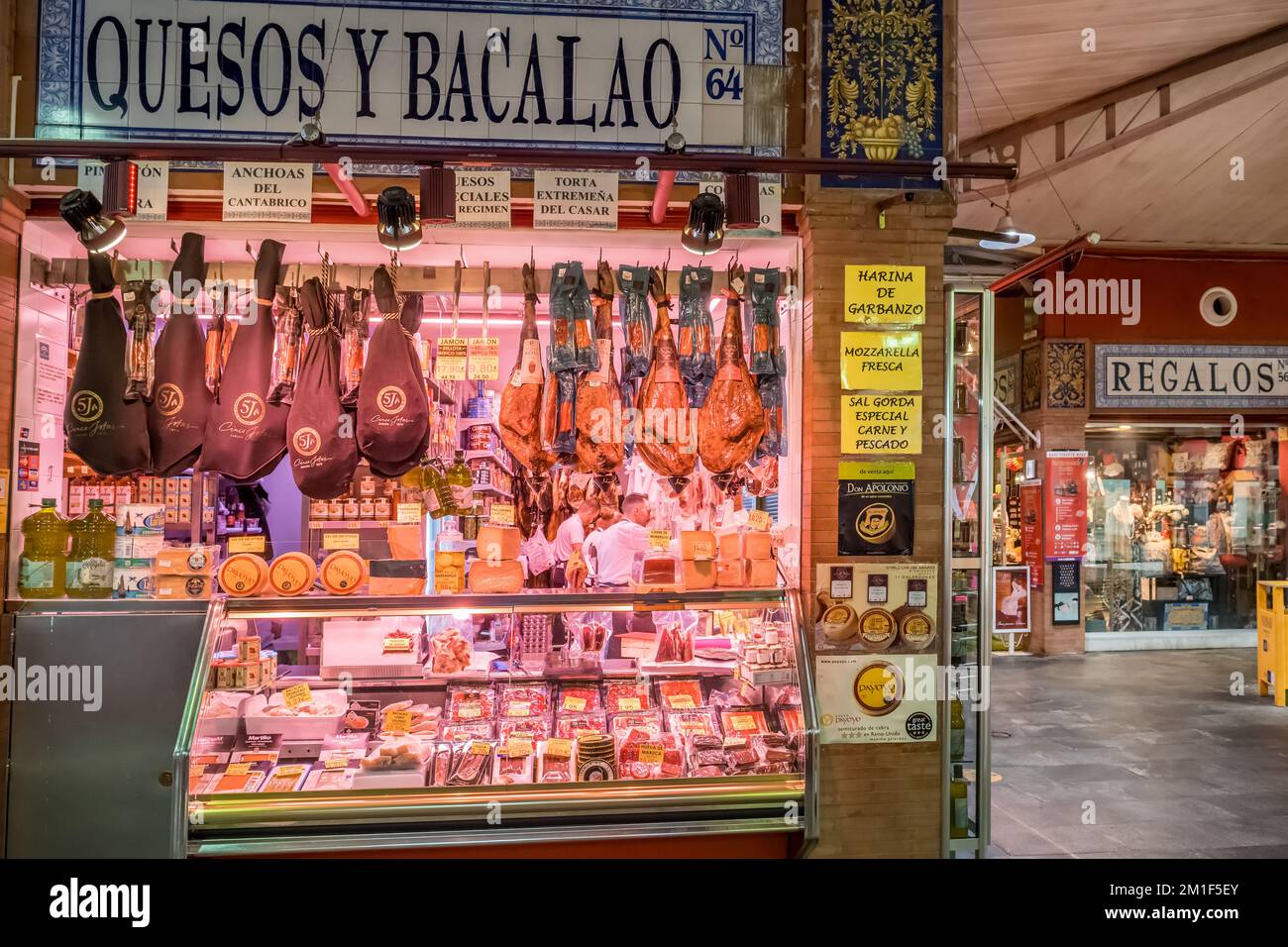 Traditional indoor Triana Market in Seville, Spain. European food ...