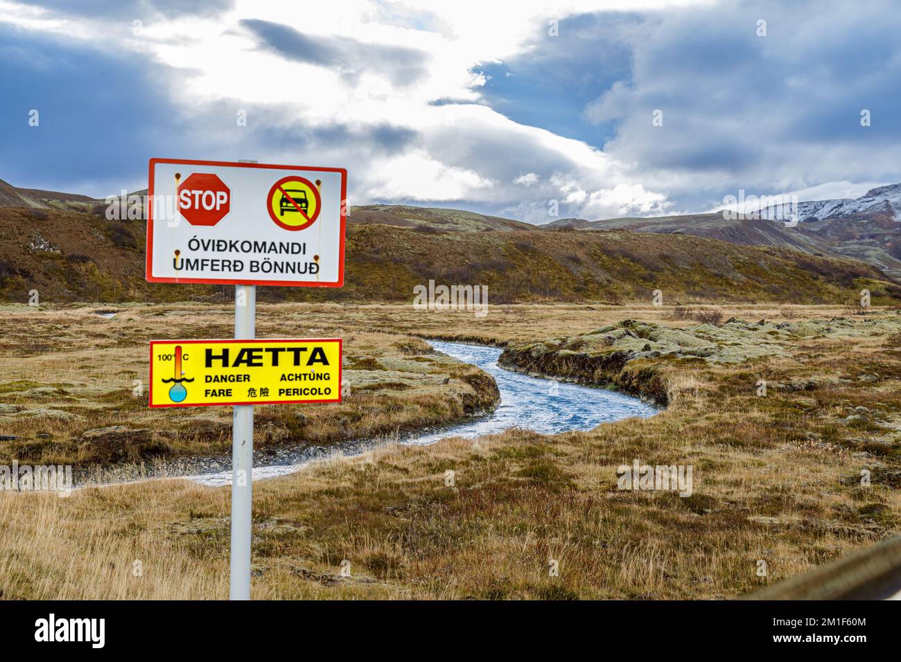 The stream rising from a hot spring with a warning notice in the east ...