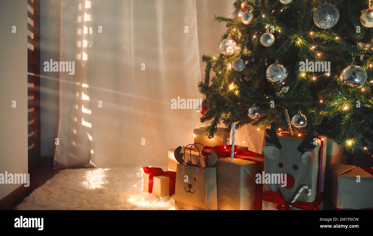 Christmas Tree At Window Light Stock Photo - Alamy