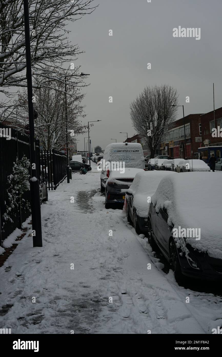 Snow-covered cars on Carlisle Rd in Colindale, London, England, U.K ...