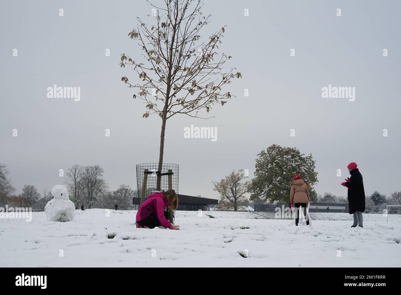 Children building Snow Man in Montrose Pk, Barnet, Colindale, London ...