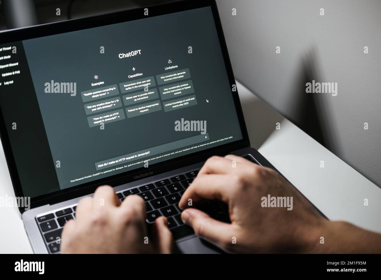 Screen with ChatGPT chat with AI or artificial intelligence. Man search ...