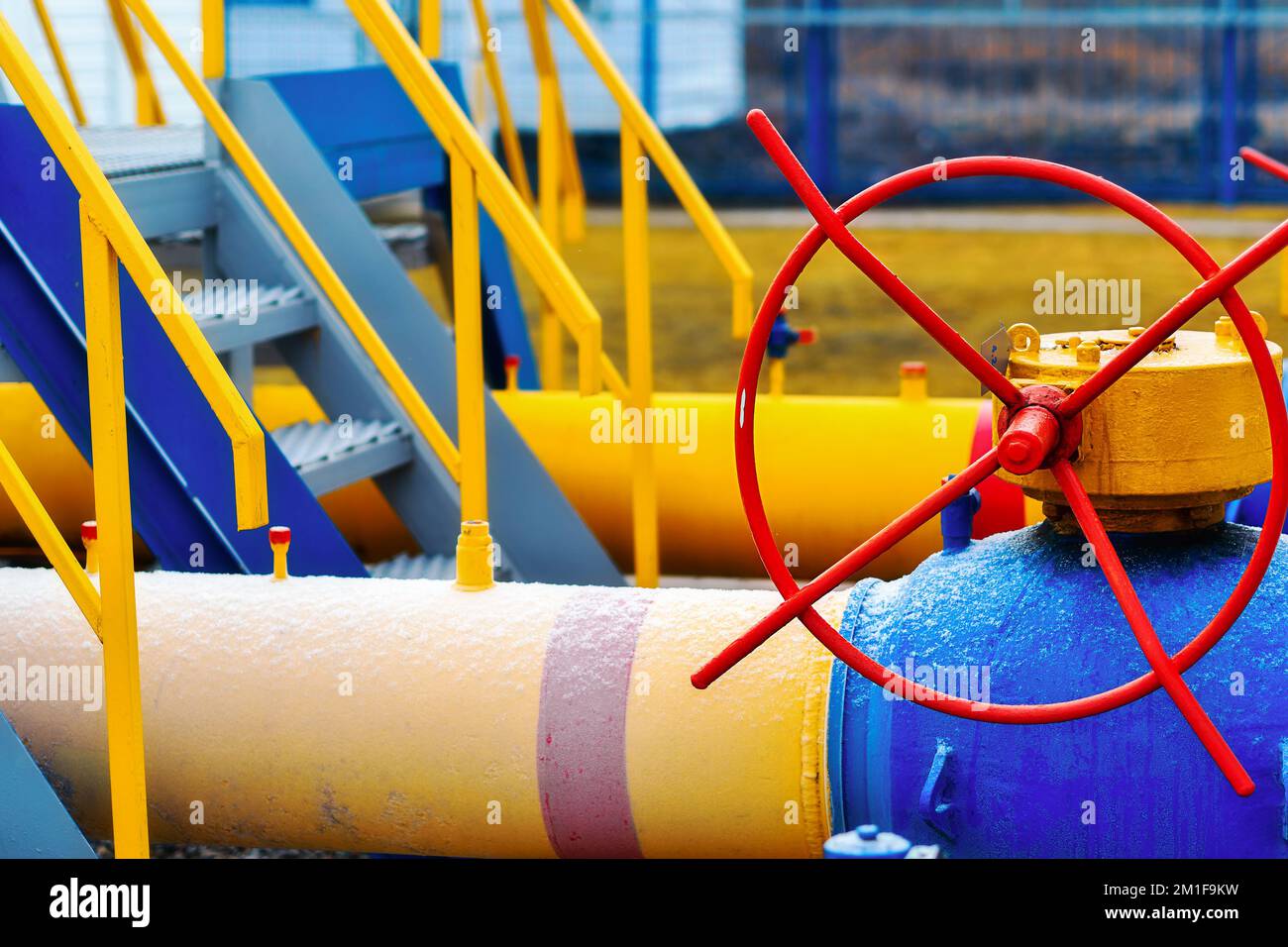 Industrial background. The gas pipeline is yellow with additional ...