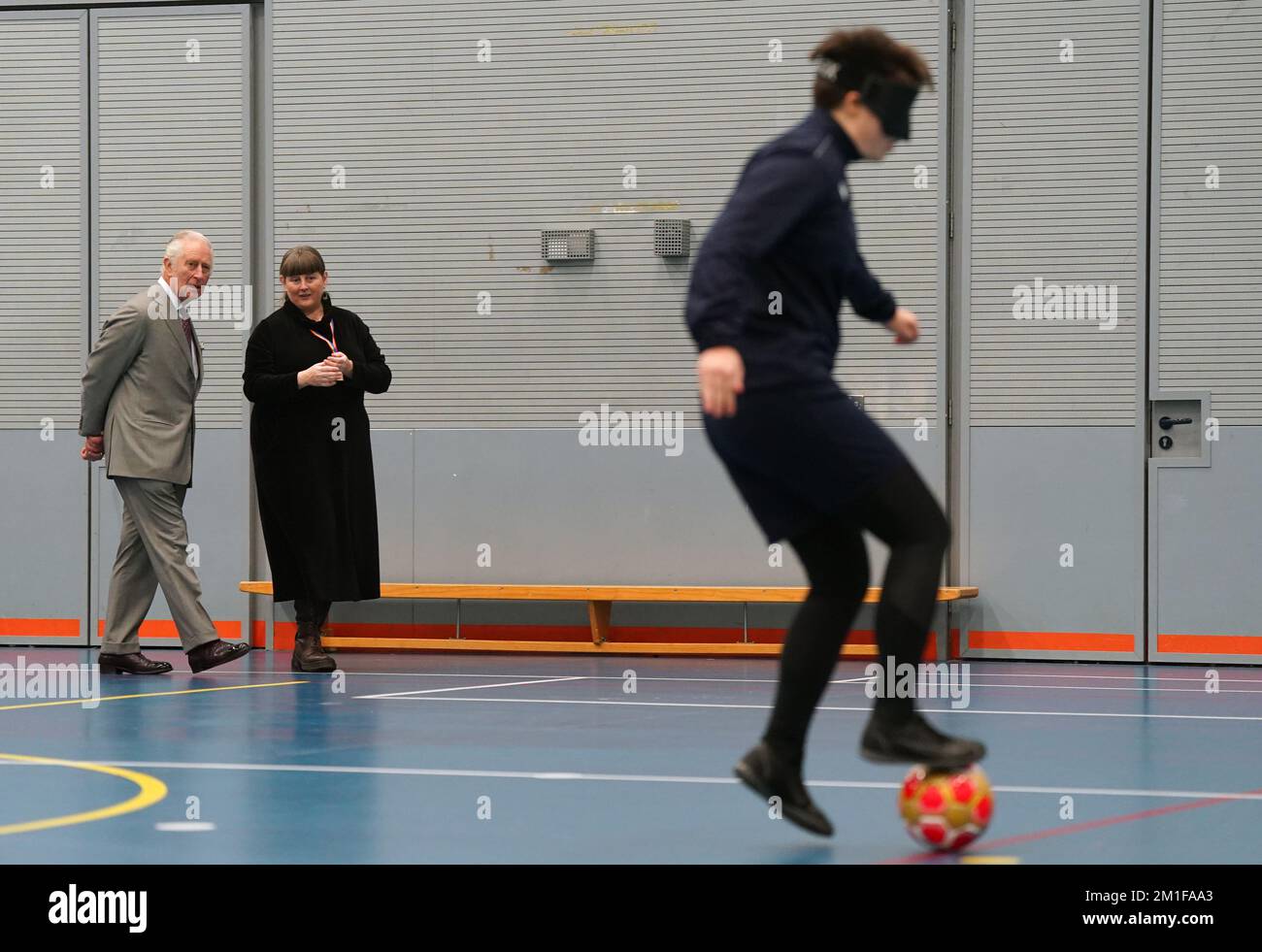 King Charles III watching a demonstration of blind football during his ...