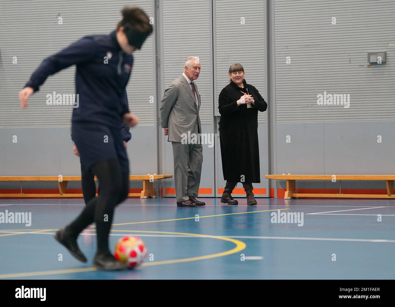King Charles III watching a demonstration of blind football during his ...