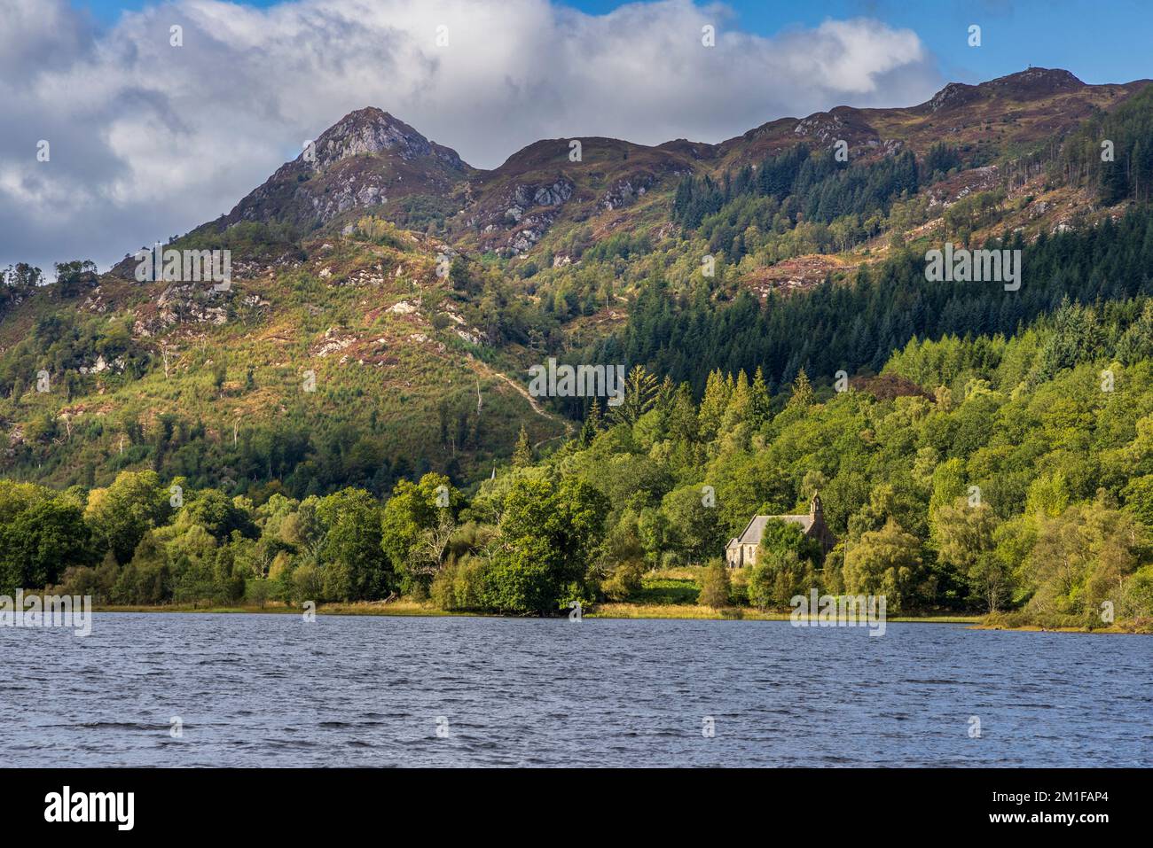 Ben A’an and Trossachs church across Loch Achray in the Trossachs ...