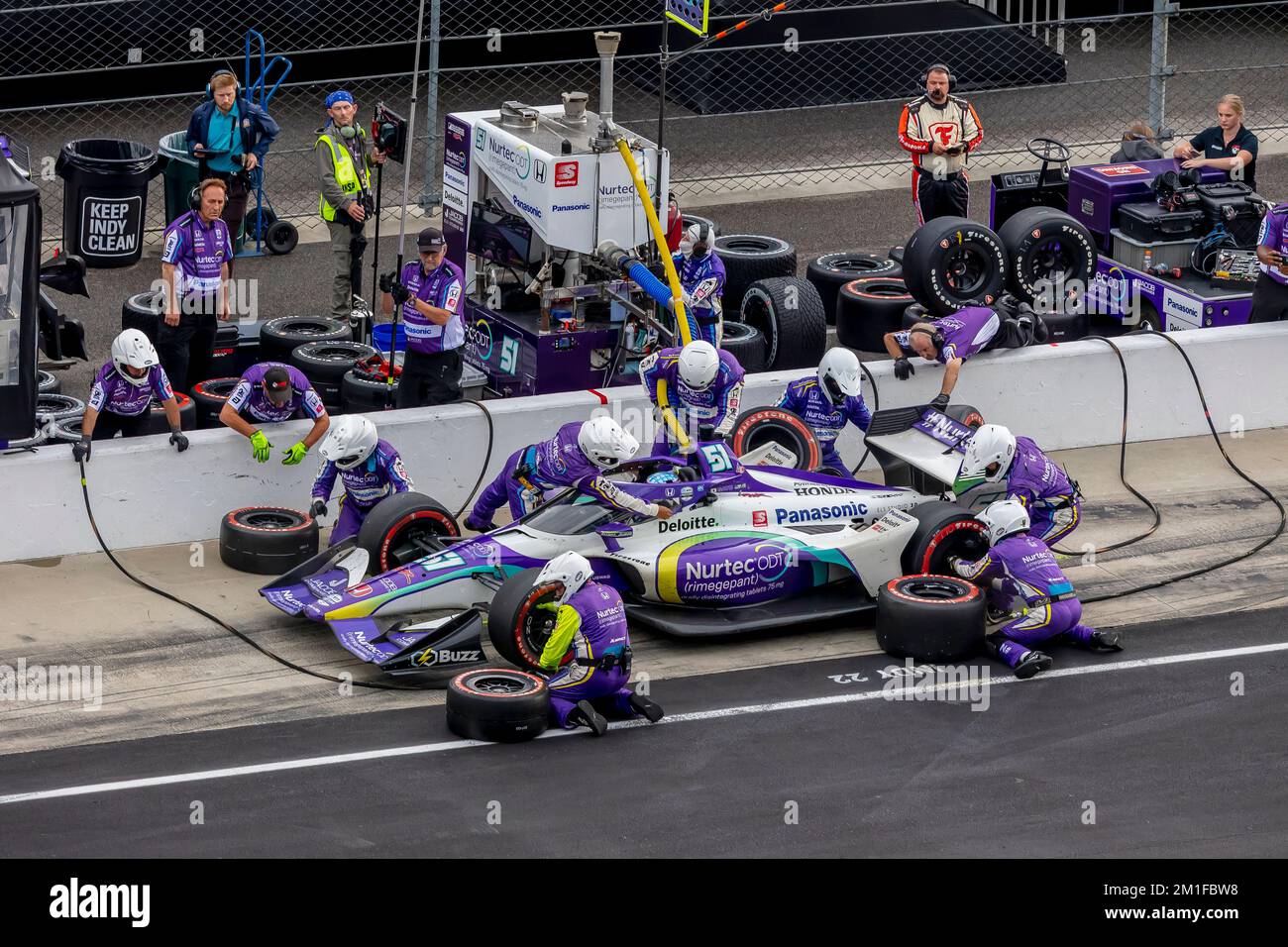 TAKUMA SATO (51) of Tokyo, Japan brings his car in for service during ...