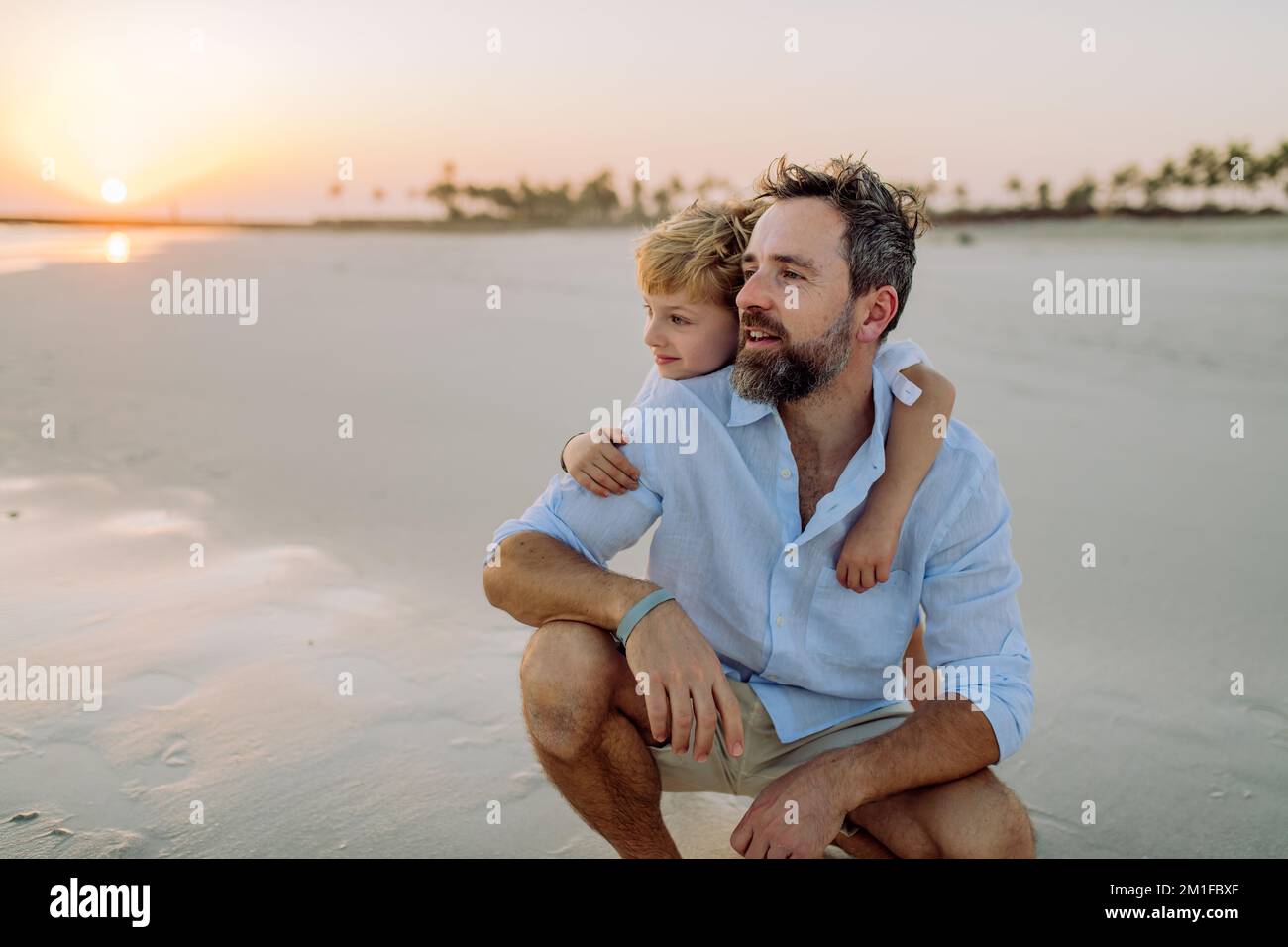 Father son sea sunset hi-res stock photography and images - Alamy