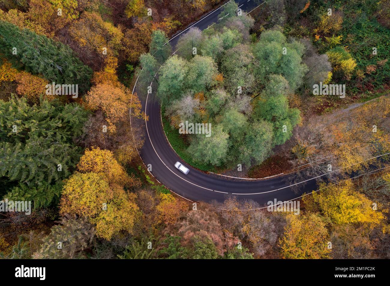 An aerial view of a highway with colorful trees around in Solingen in ...