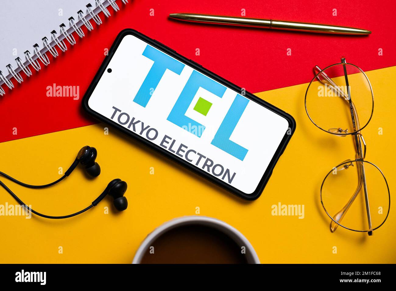 In this photo illustration a Tokyo Electron logo seen displayed on a ...