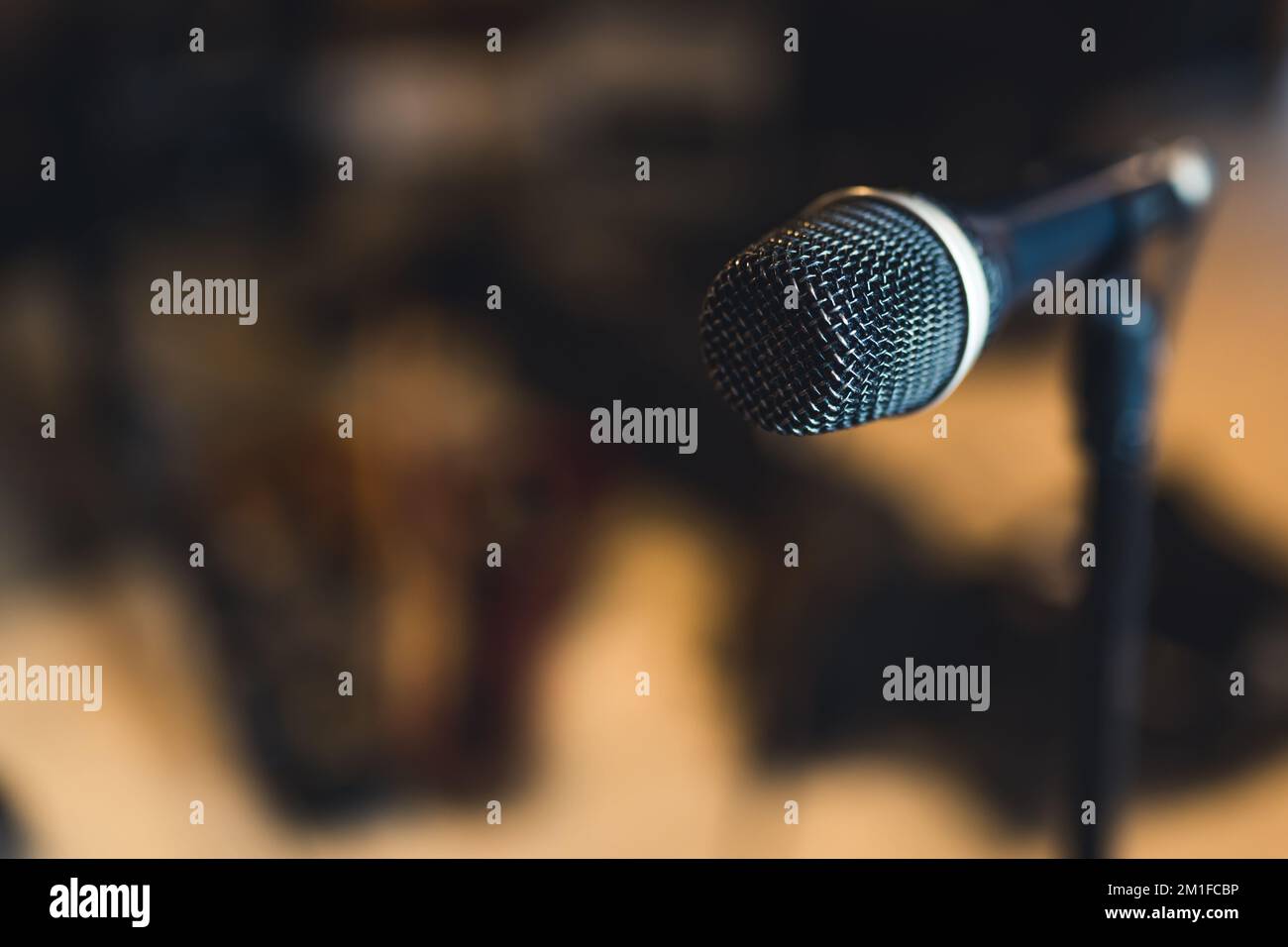 microphone on blurred dark background, music concept recording studio ...