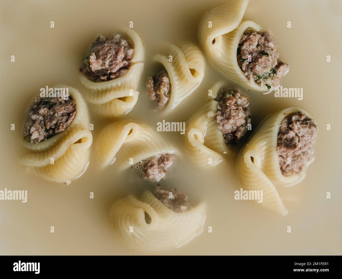 high angle view of some escudella de Nadal or sopa de galets, a soup ...