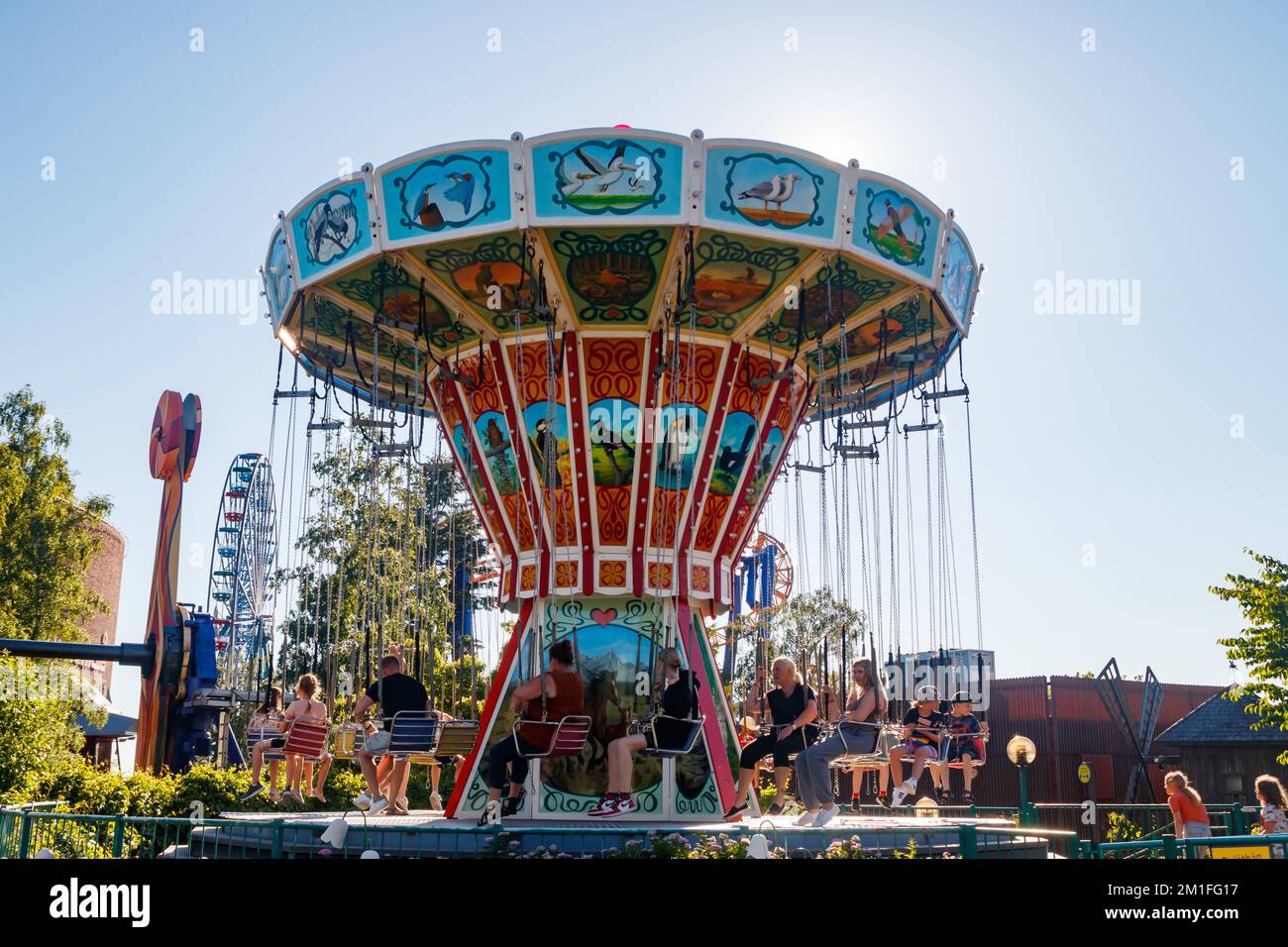 Helsinki, Finland - 24 June 2022: Ride chain carousel Ketjukaruselli in ...