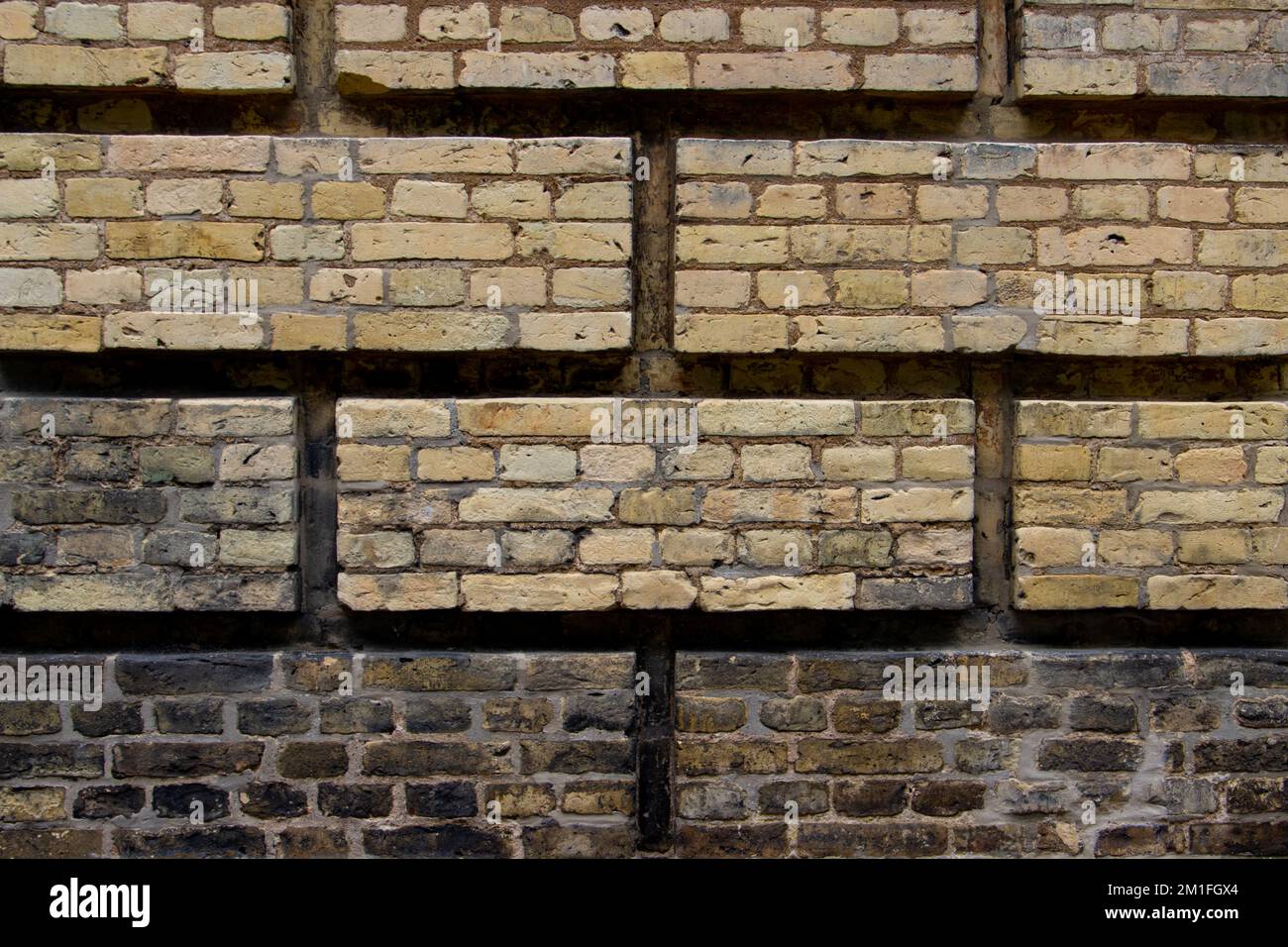 Old weathered beige brown brick wall background Stock Photo - Alamy