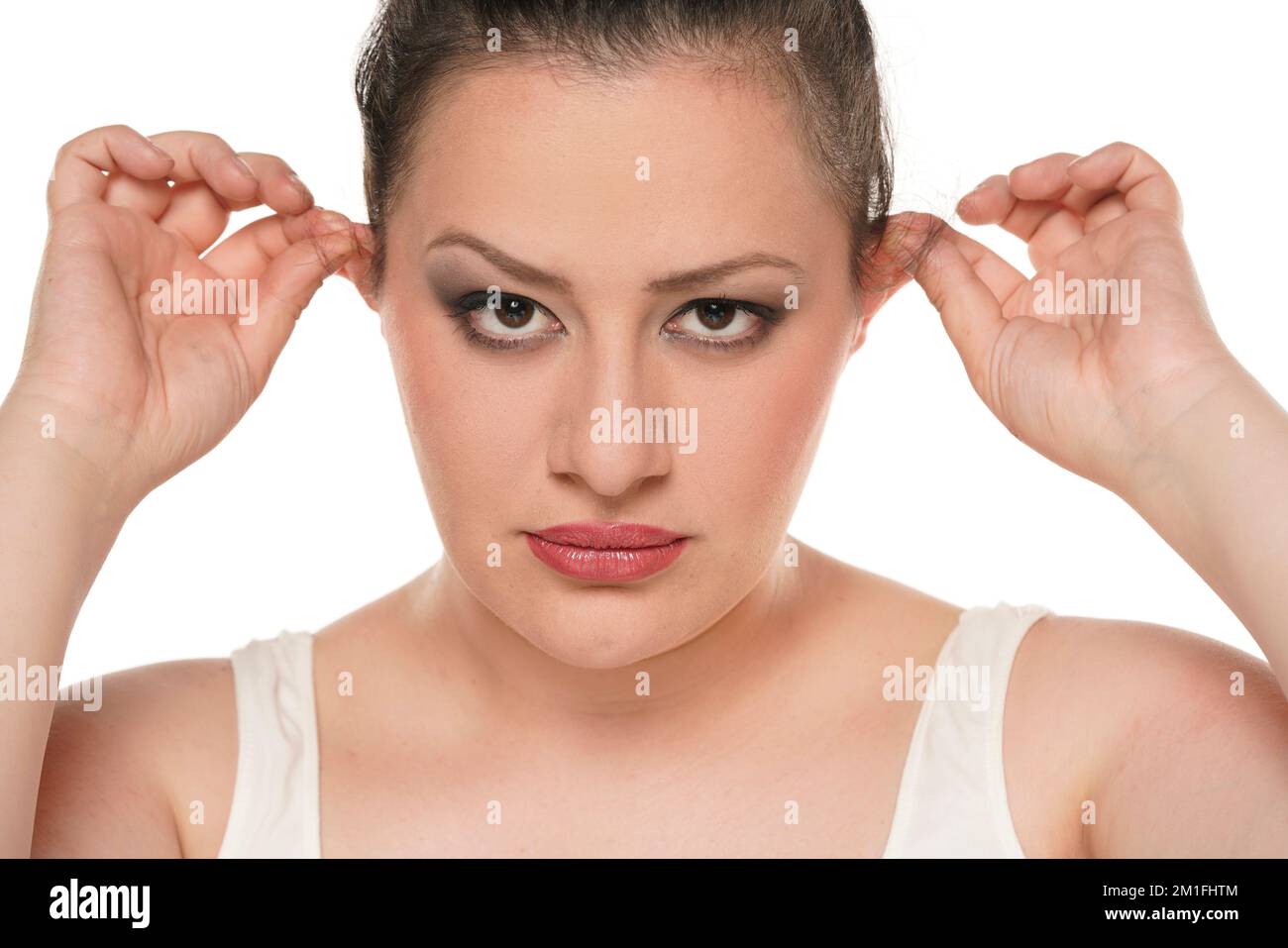 Ear pulling hi-res stock photography and images - Alamy