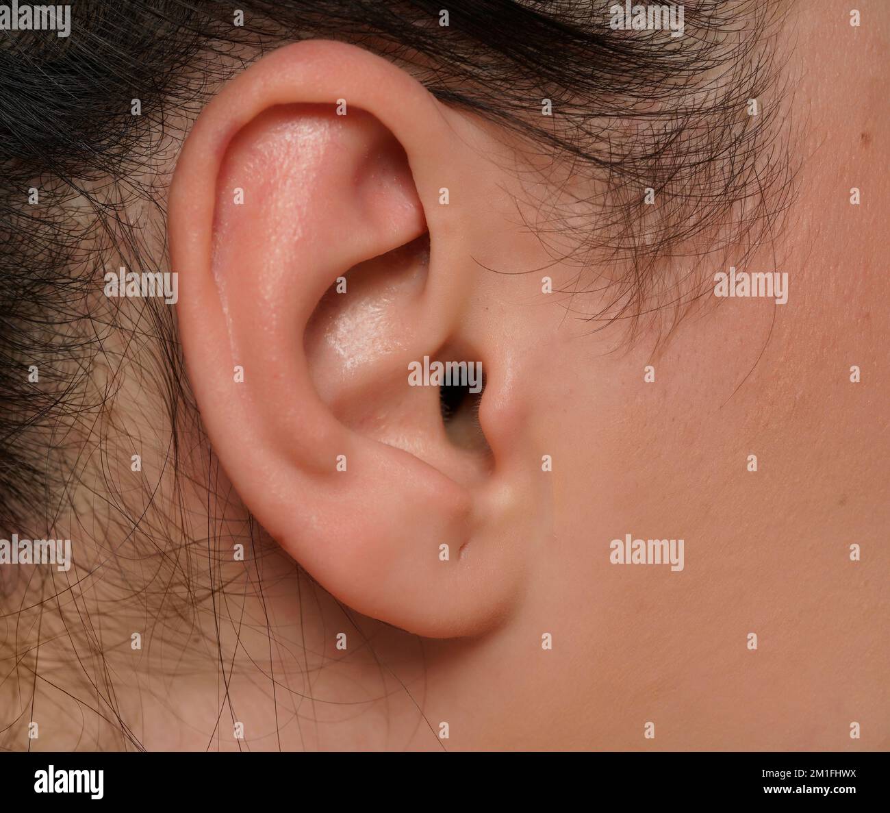 Woman close profile listen hi-res stock photography and images - Alamy