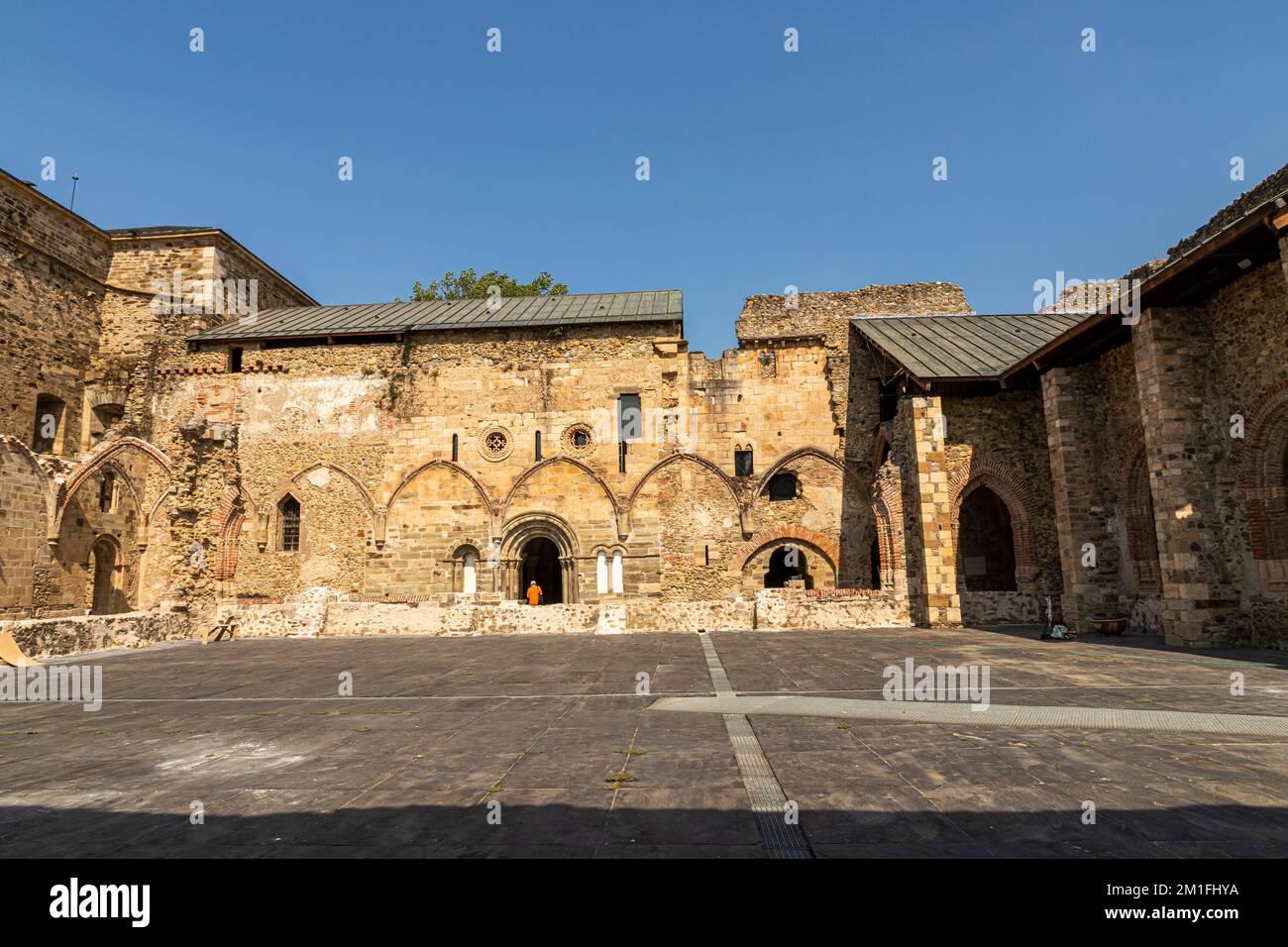 Cloister of the ruined Monastery of Saint Mary of Carracedo, El Bierzo ...