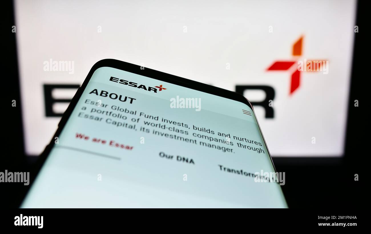Mobile phone with website of Indian conglomerate Essar Group on screen ...