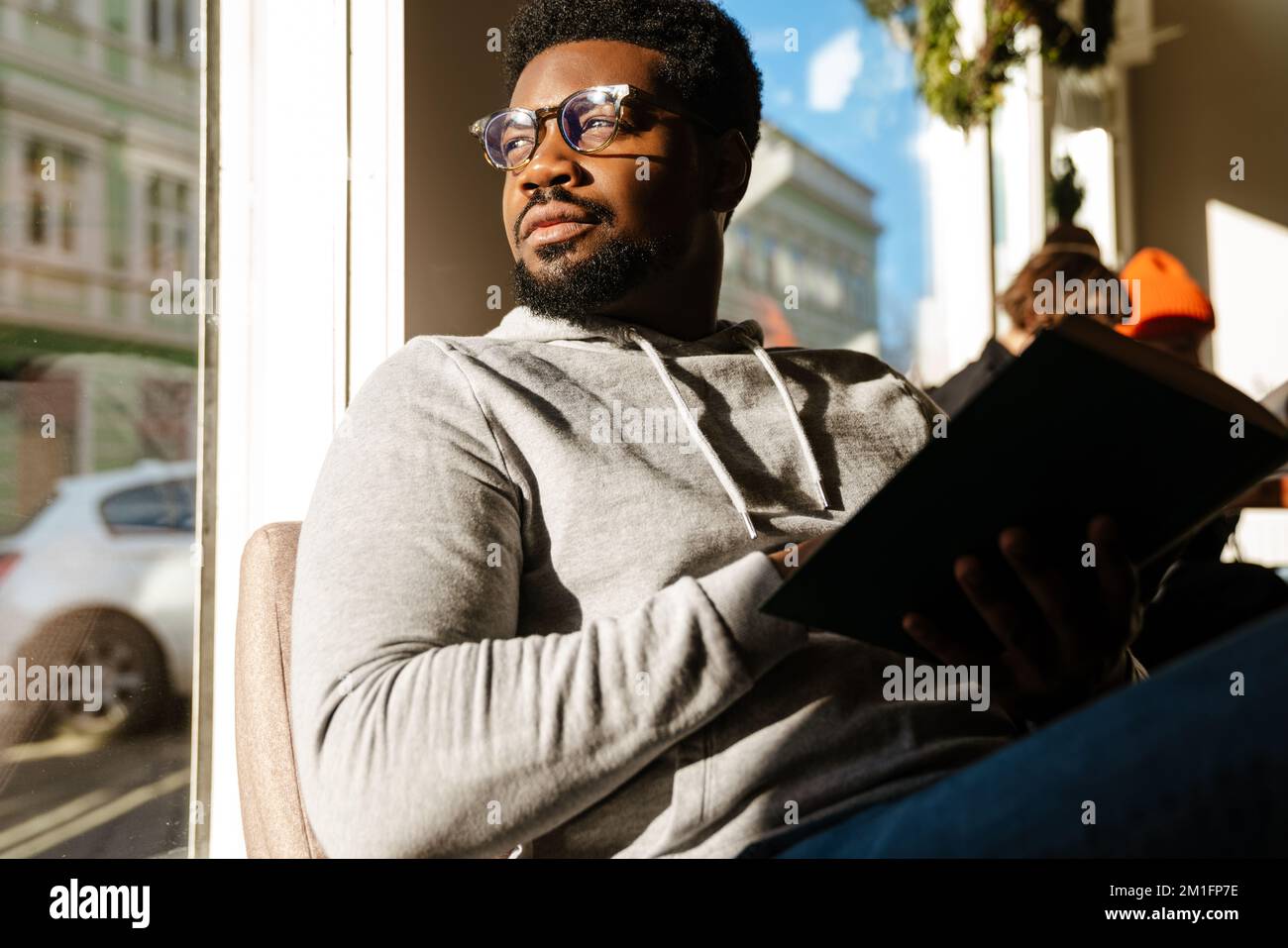 Bearded man reading book hi-res stock photography and images - Alamy