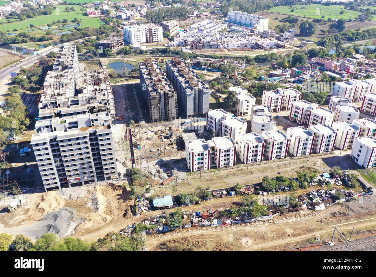 Aerial View of railway tracks and urban developments at the outskirts ...