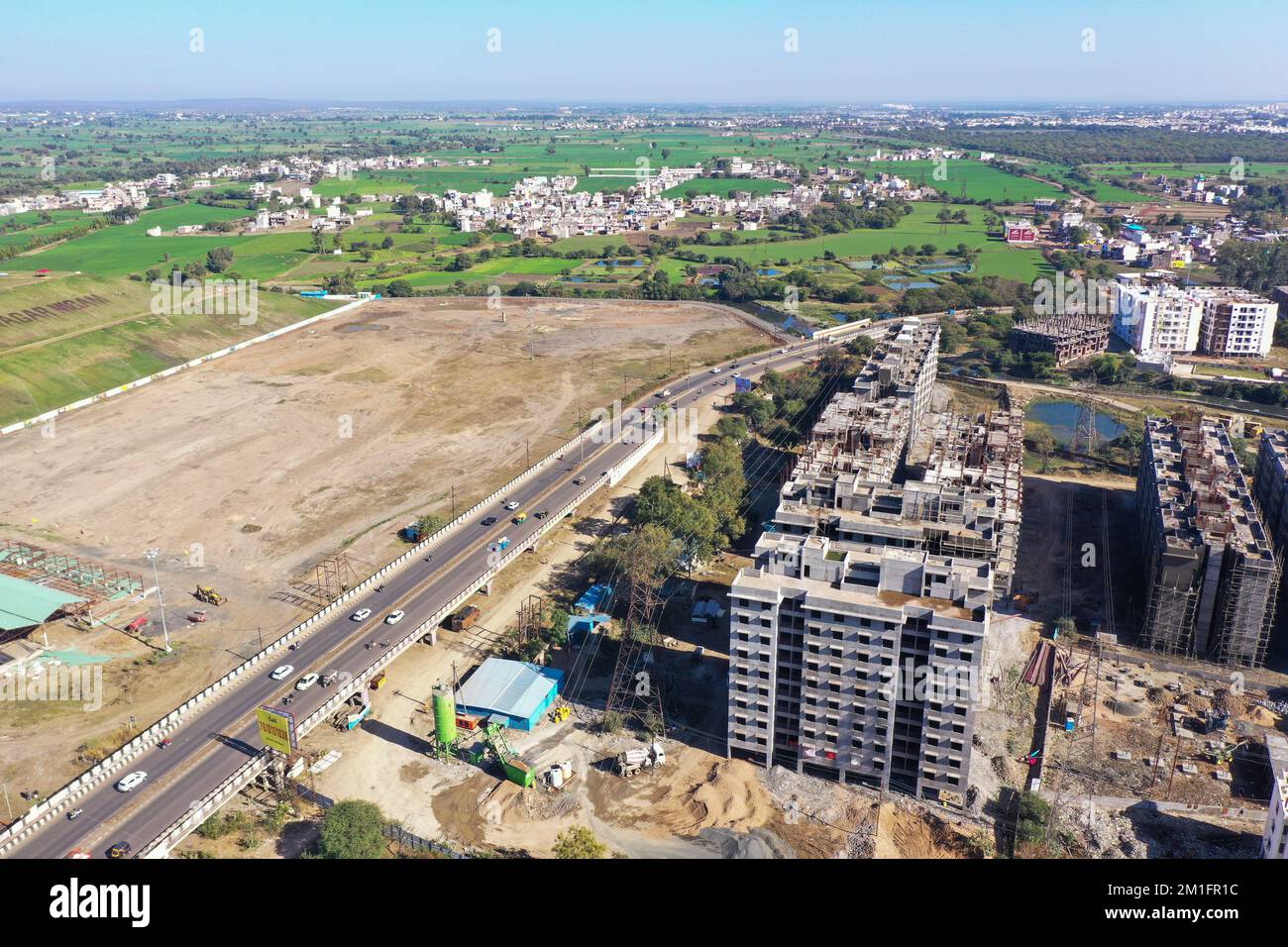 Aerial View of railway tracks and urban developments at the outskirts ...