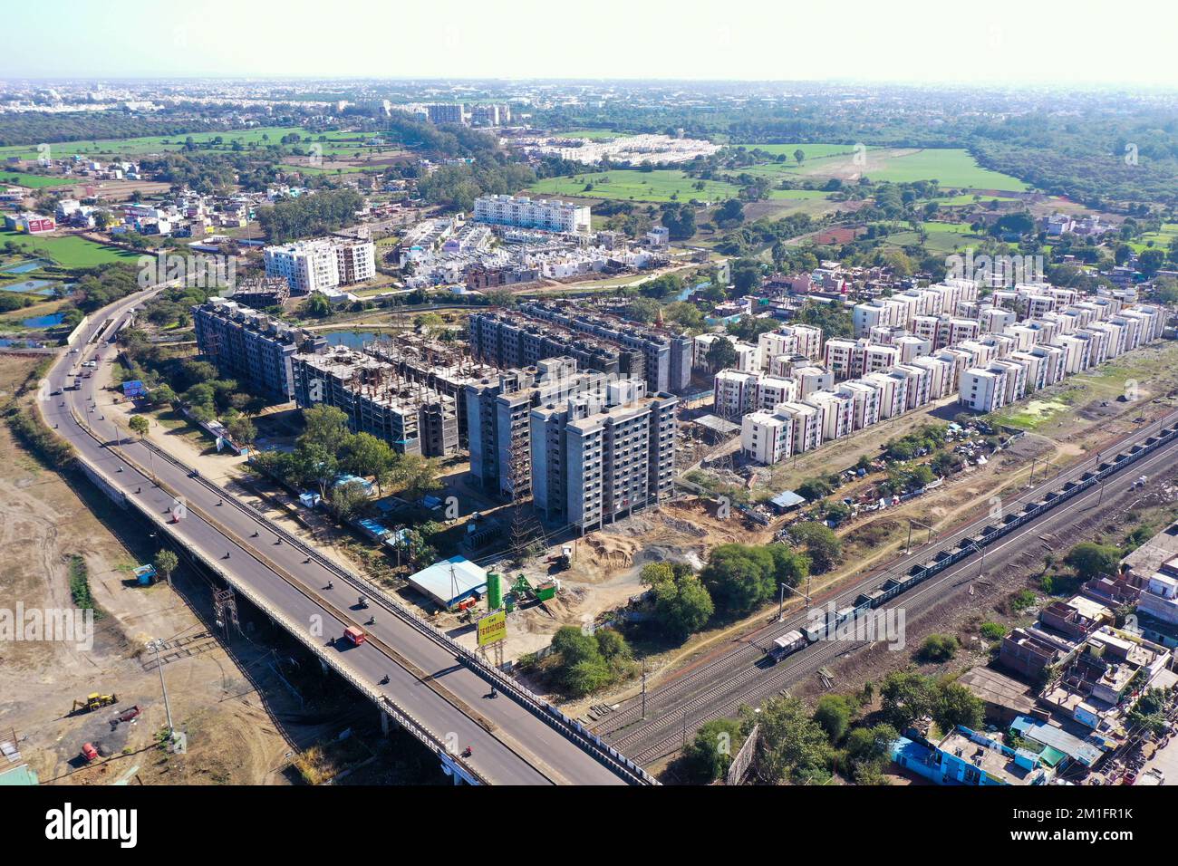 Aerial View of railway tracks and urban developments at the outskirts ...