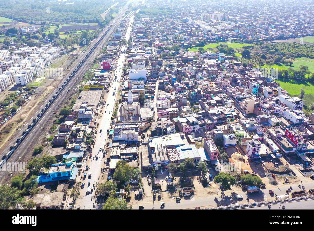 Aerial View of railway tracks and urban developments at the outskirts ...