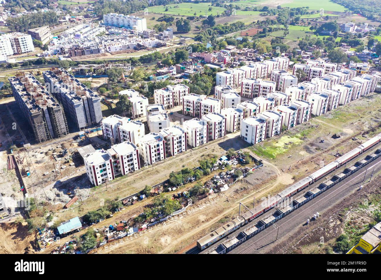 Aerial View of railway tracks and urban developments at the outskirts ...