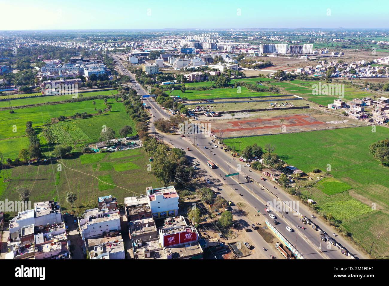 Aerial View of railway tracks and urban developments at the outskirts ...