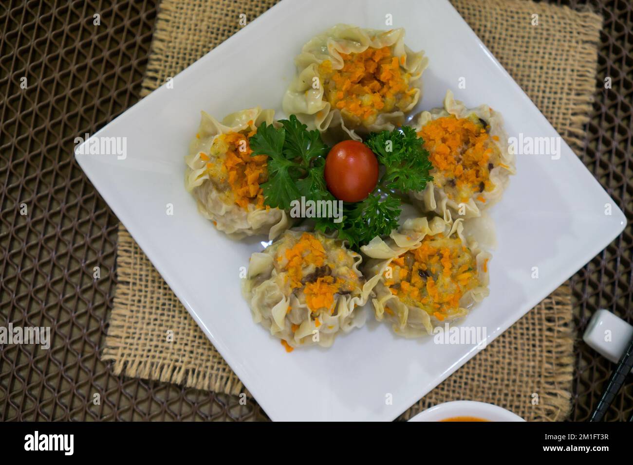 Siomay is an Indonesian dish consisting of a steamed fish or pork ...