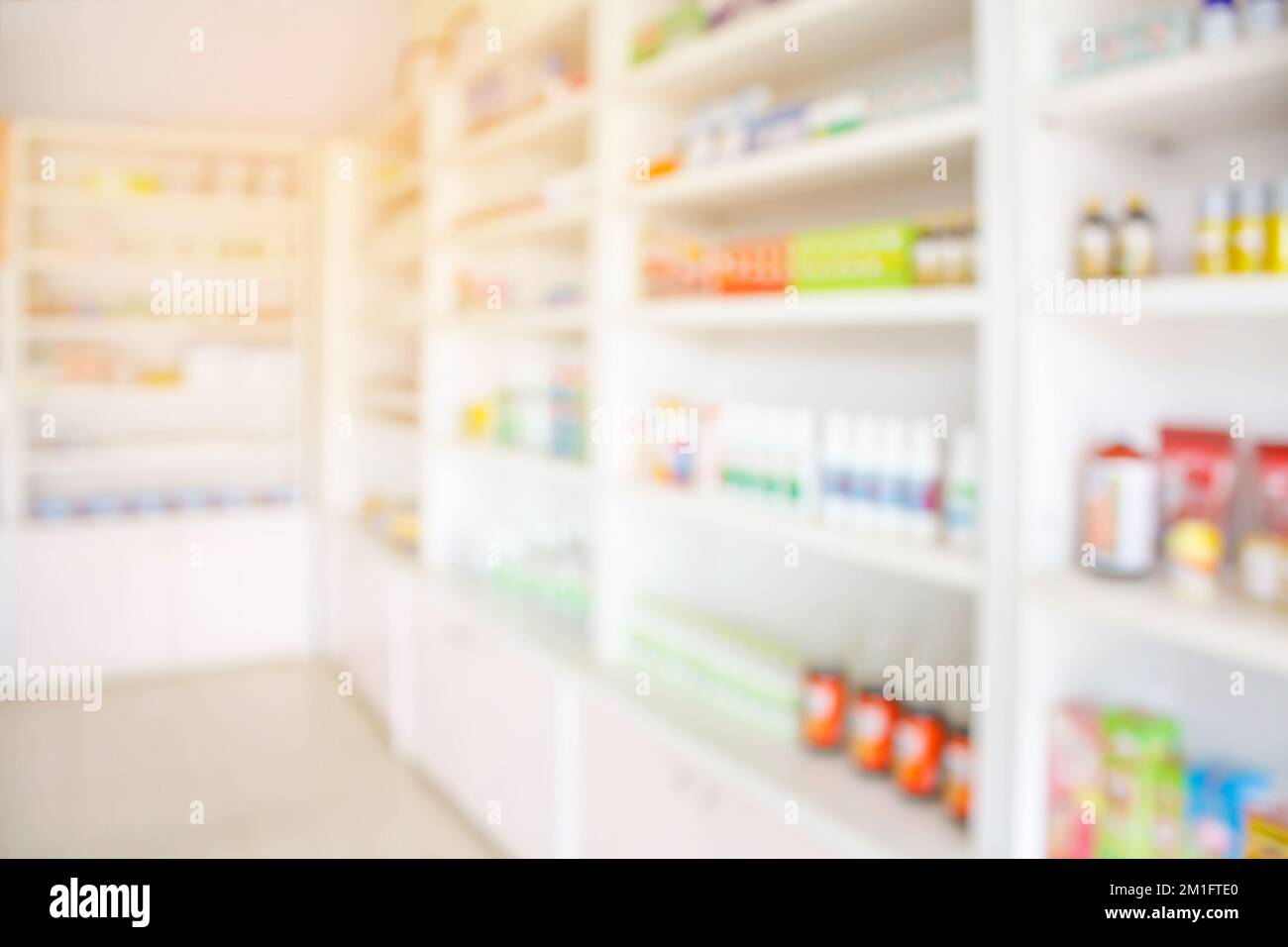 pharmacy shelves filled with medication blur background Stock Photo - Alamy