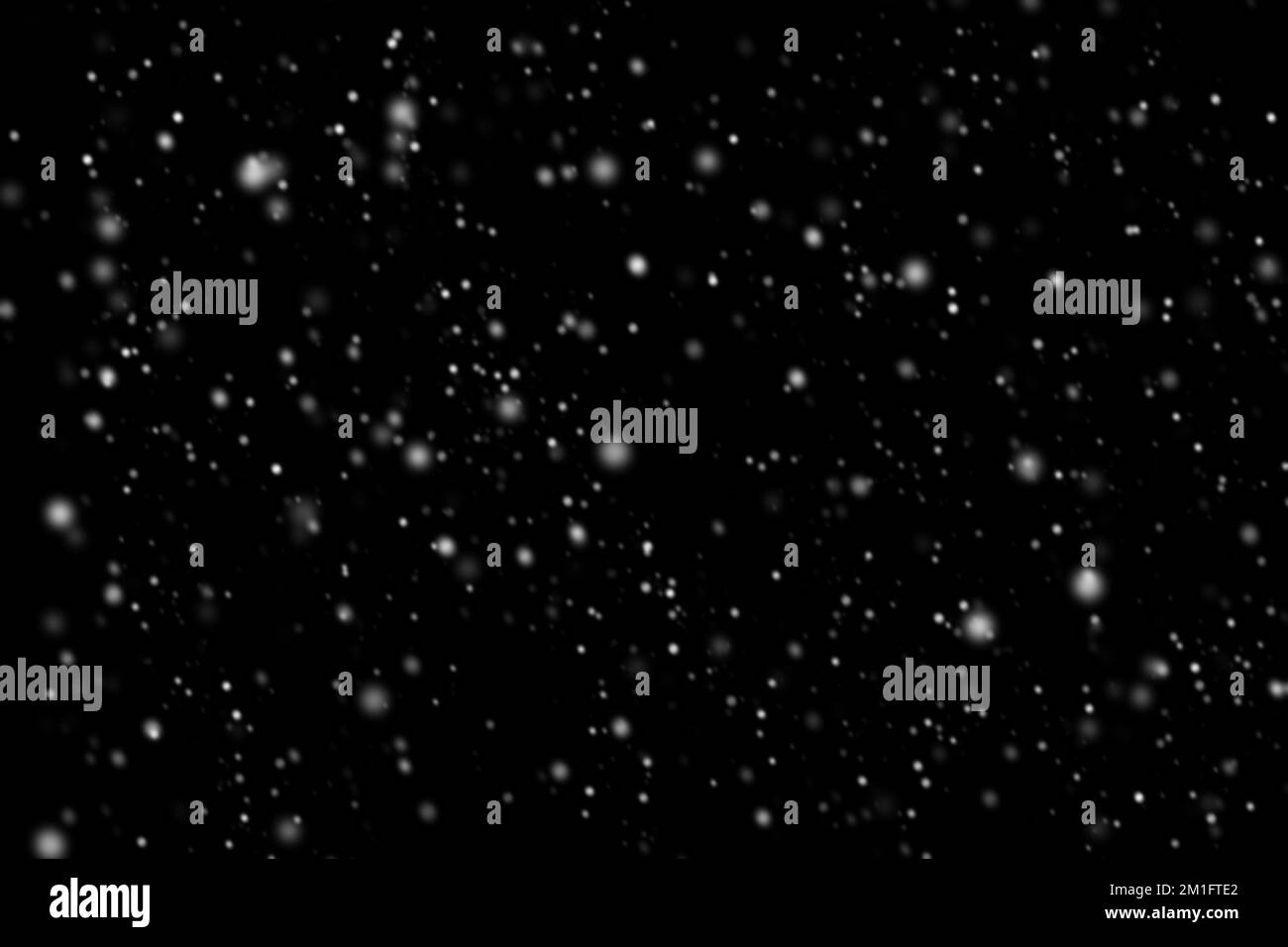 Falling snow on black background Stock Photo - Alamy