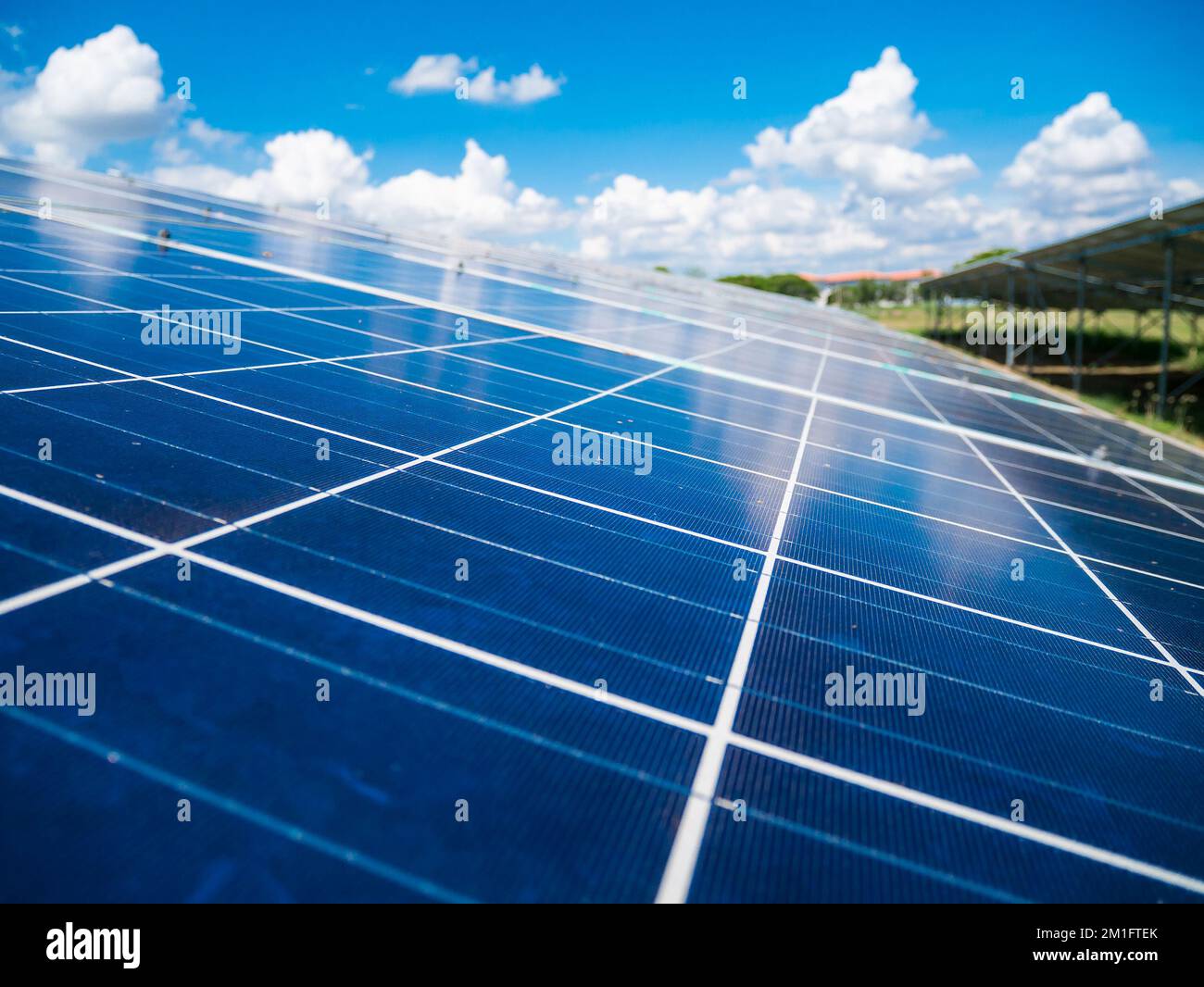 Solar panels with blue sky and clouds, solar energy environmentally ...