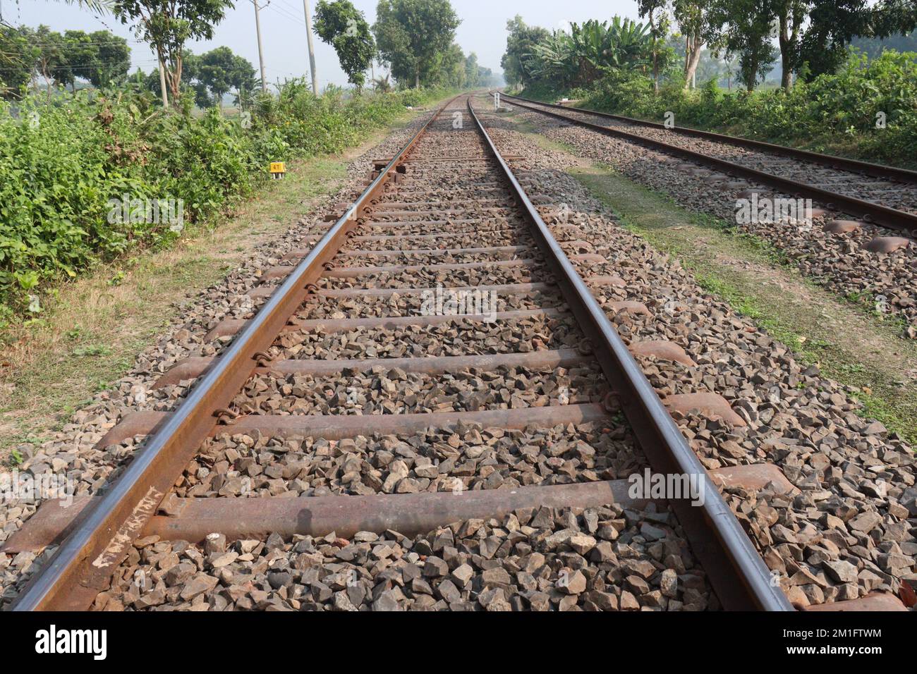 Narrow gauge railway on ground for rail Stock Photo - Alamy