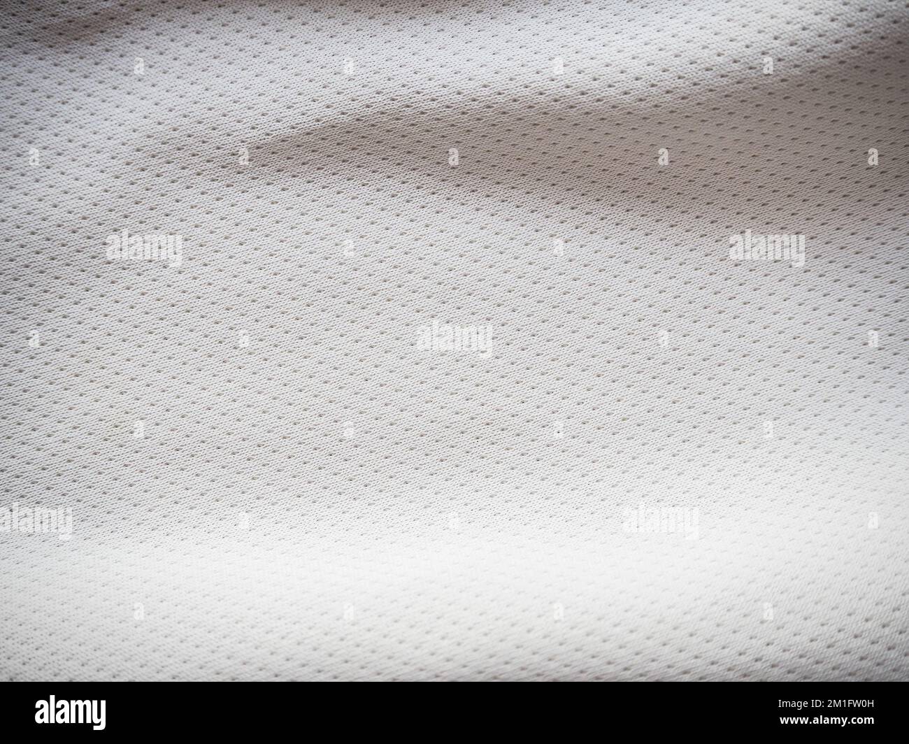 White sports jersey fabric texture background Stock Photo - Alamy