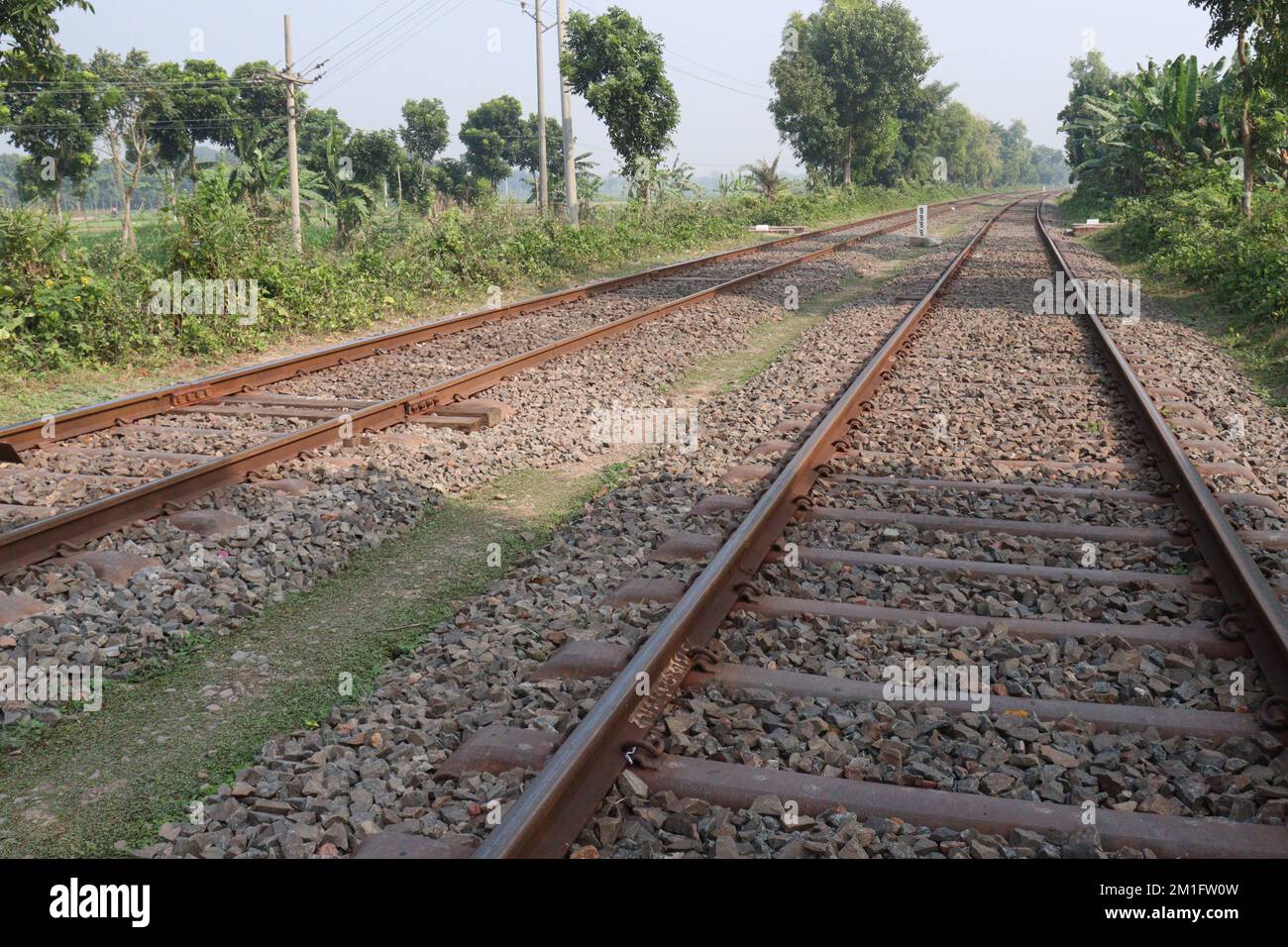 Narrow gauge railway on ground for rail Stock Photo - Alamy