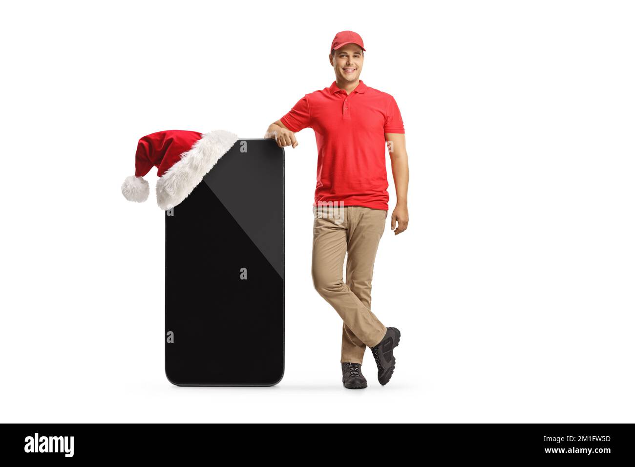 Full length portrait of a delivery guy standing next to a big mobile ...