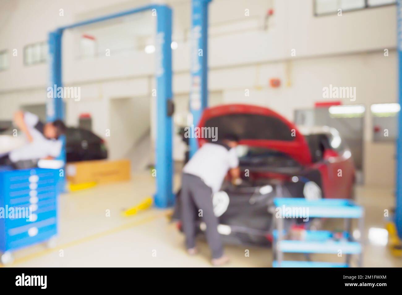 Mechanic working in car hi-res stock photography and images - Alamy