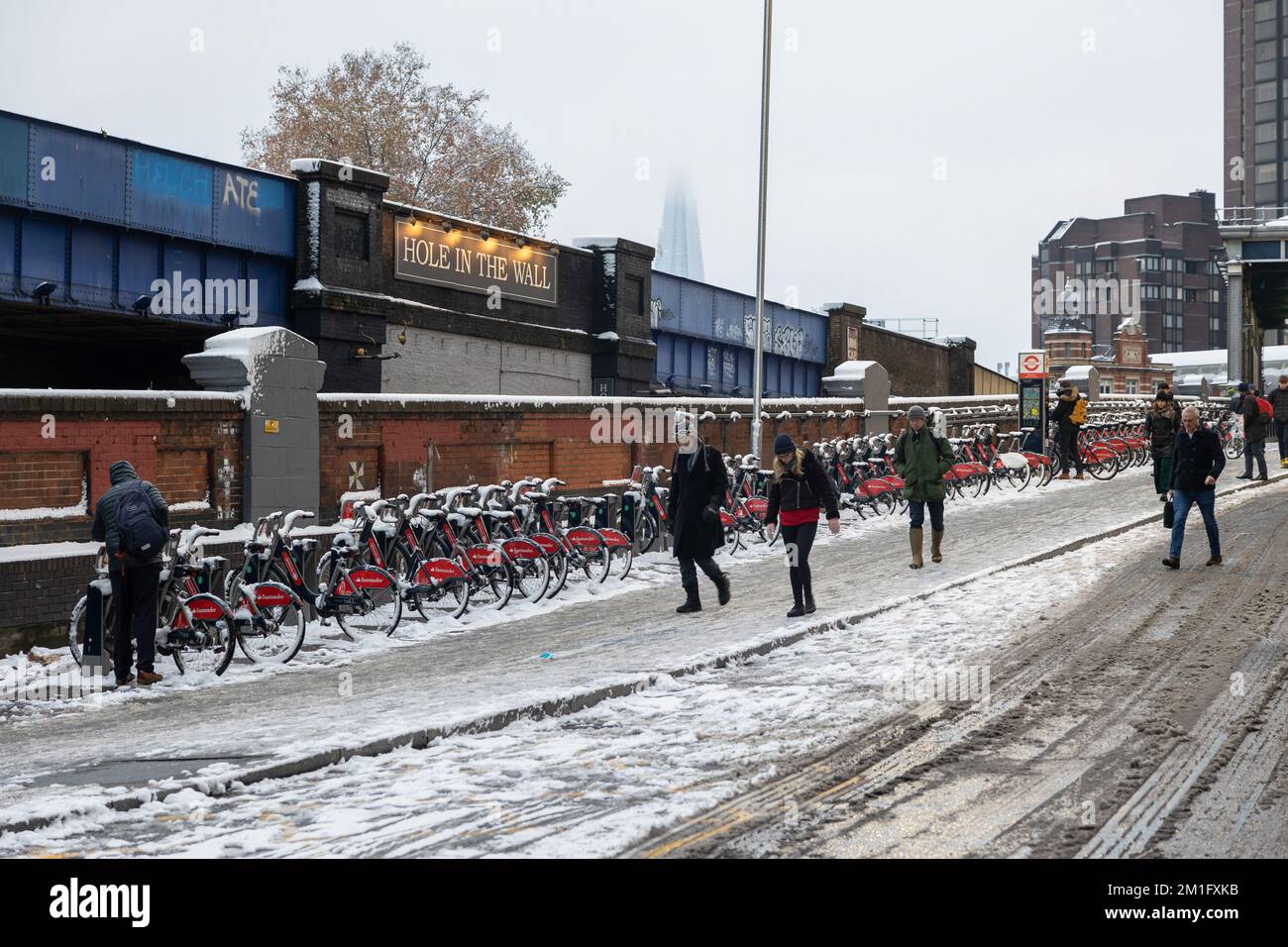 Public are seen walking along a snow covered road outside the Waterloo ...