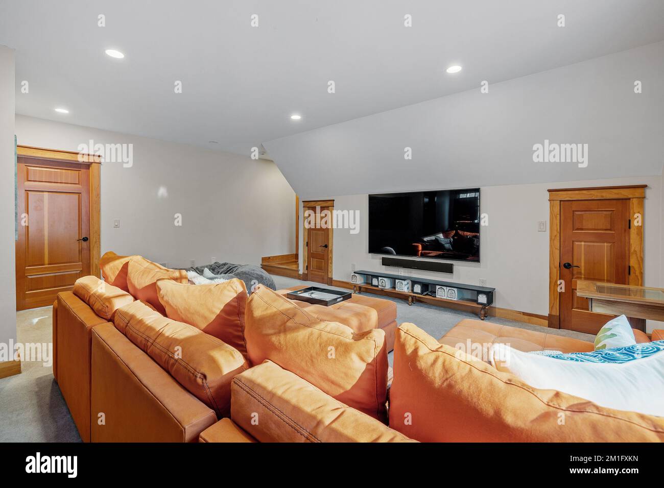 A beautiful contemporary rustic home interior den design with brown ...