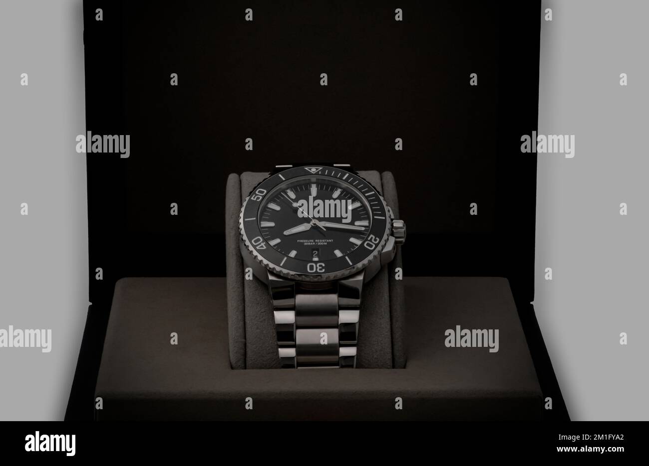 A Swiss made diver watch with steel bracelet, screw down crown, ceramic ...