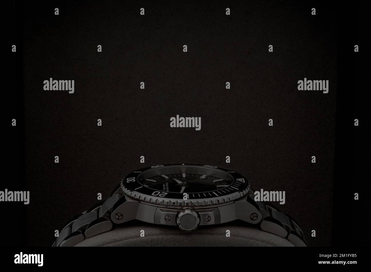 A Swiss made diver watch with steel bracelet, screw down crown, ceramic ...