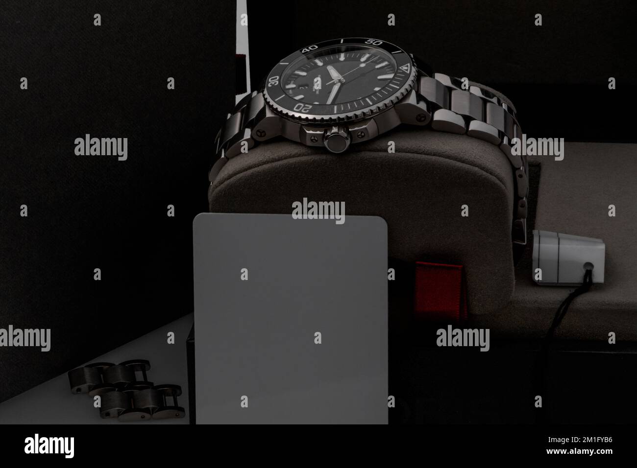 A Swiss made diver watch with steel bracelet, screw down crown, ceramic ...