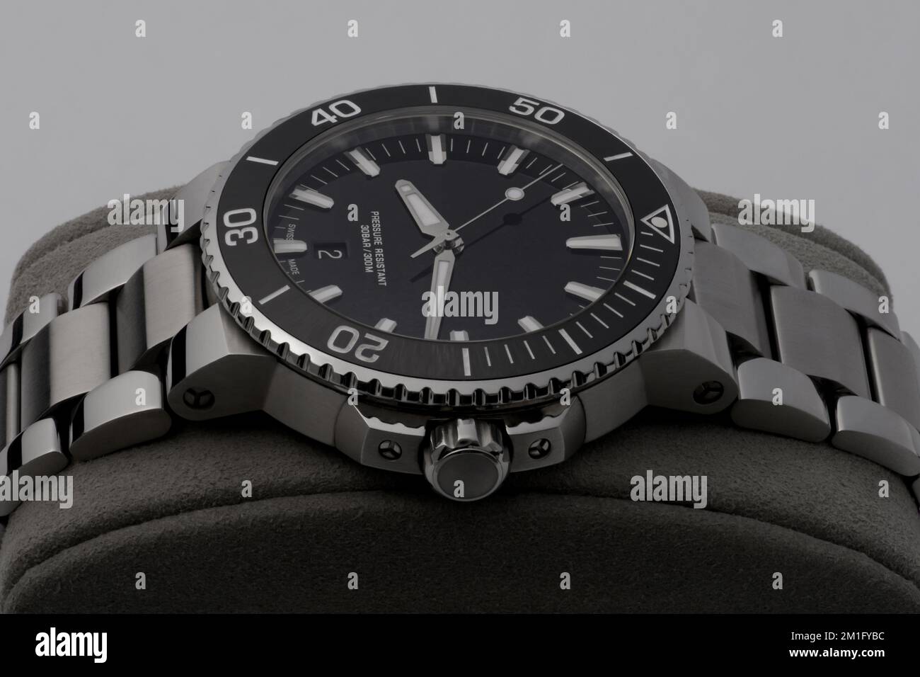 A Swiss made diver watch with steel bracelet, screw down crown, ceramic ...