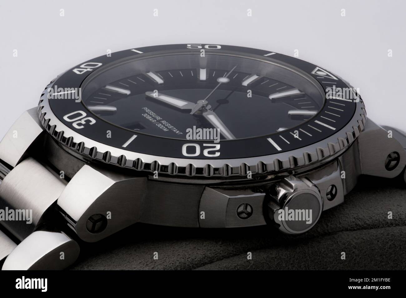 A Swiss made diver watch with steel bracelet, screw down crown, ceramic ...