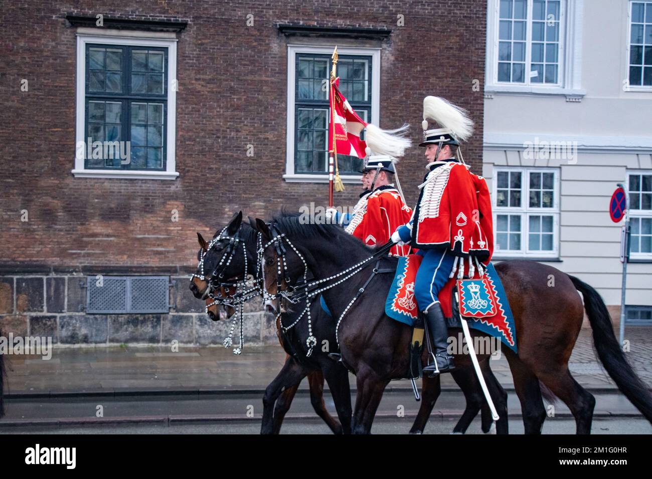 Queens Guard Knight riding horses in the streets of Copenhagen, Denmark ...