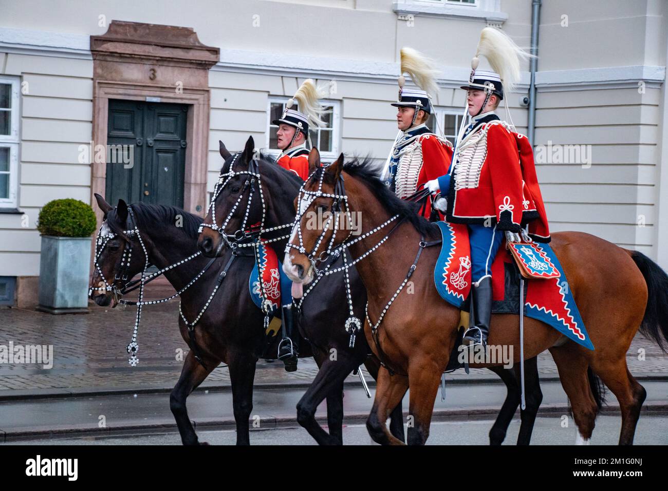 Queens Guard Knight riding horses in the streets of Copenhagen, Denmark ...