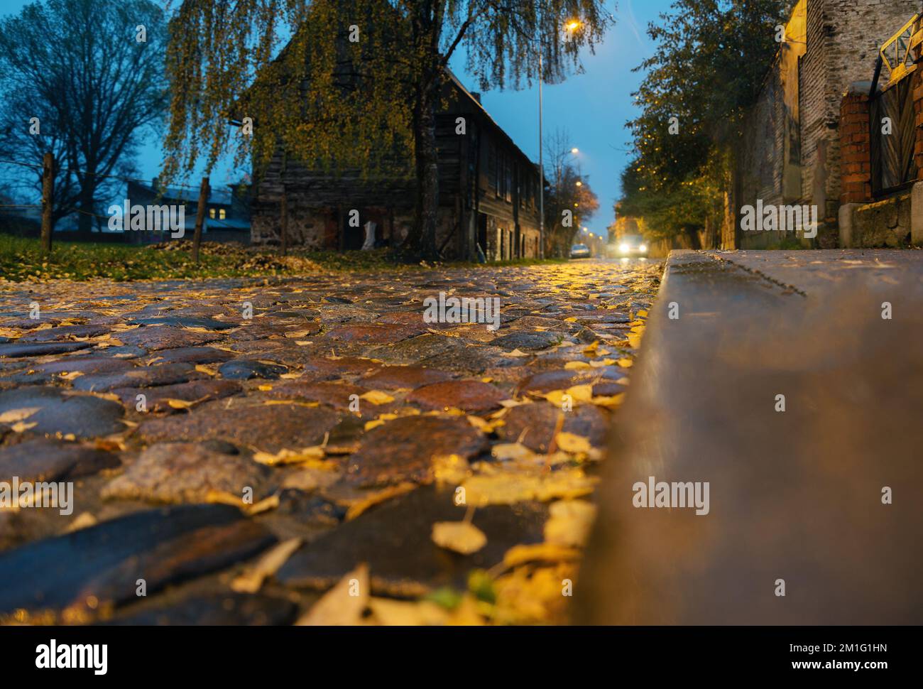 Night view of an empty street in a small town Stock Photo - Alamy