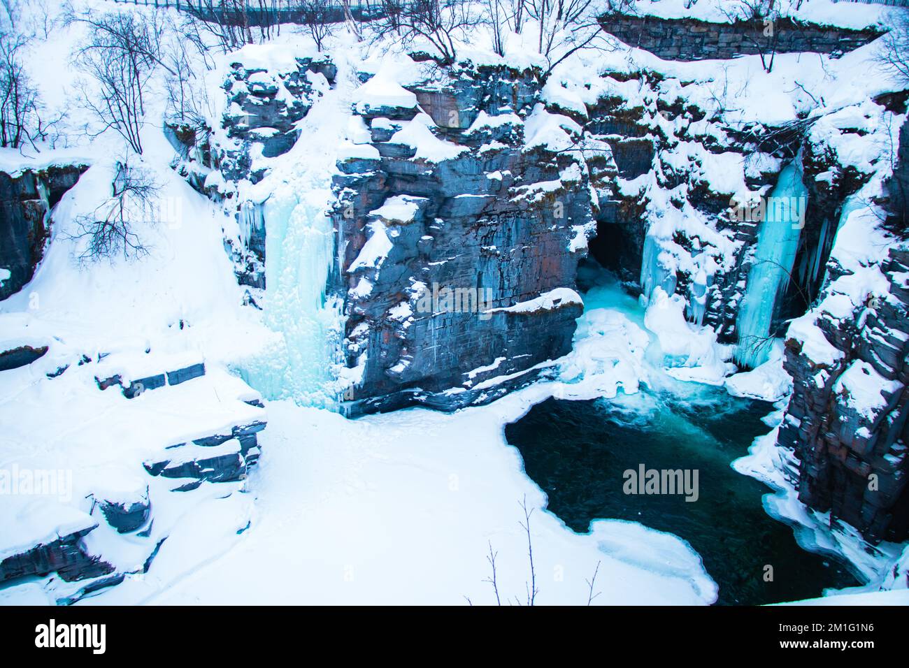 Frozen Waterfall Landscape in Abisko National Park, Sweden in Winter ...
